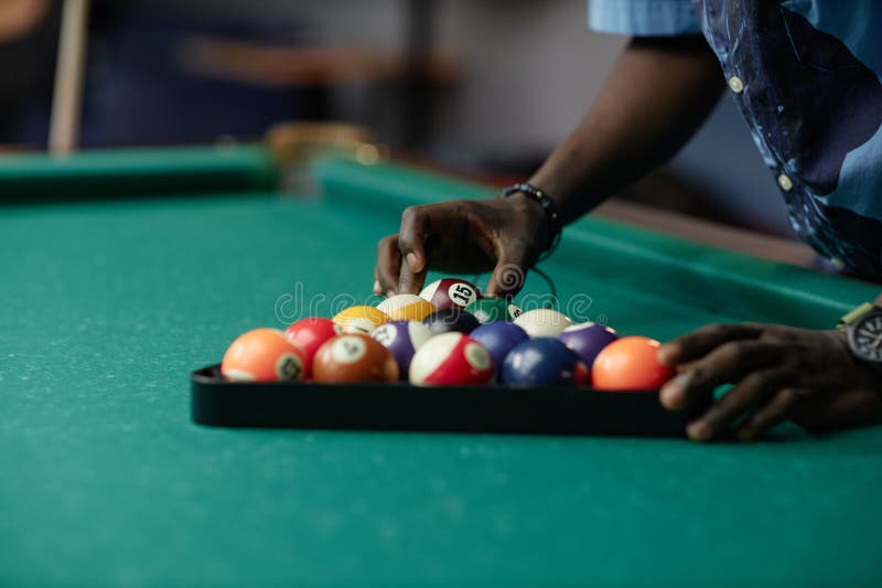Setting Up Billiard Balls on Green Pool Table Stock Photo - Image of ...