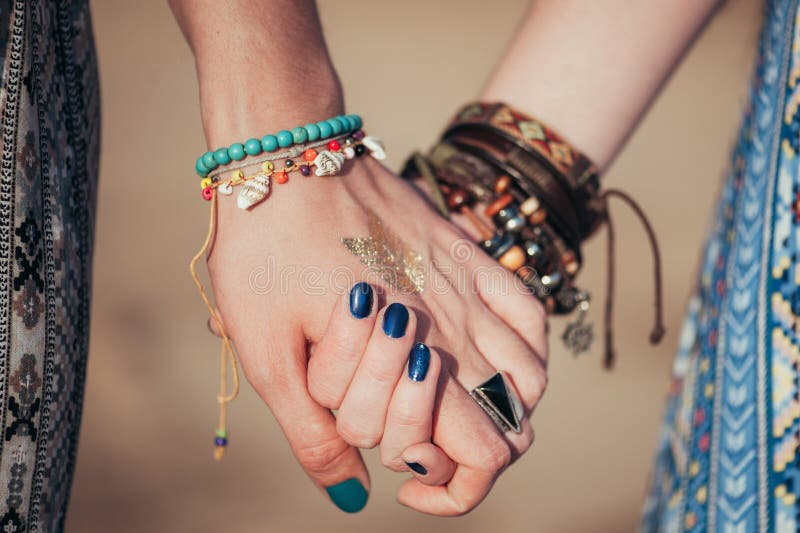 Close Up Hands with Boho Accessories Stock Image - Image of blue ...