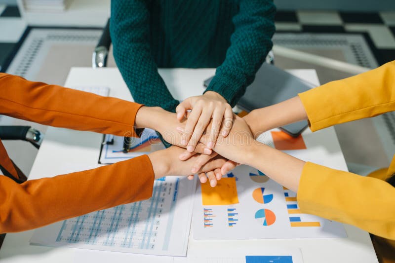 Close Up on Hands of Business People Join Together Their Hands Together ...