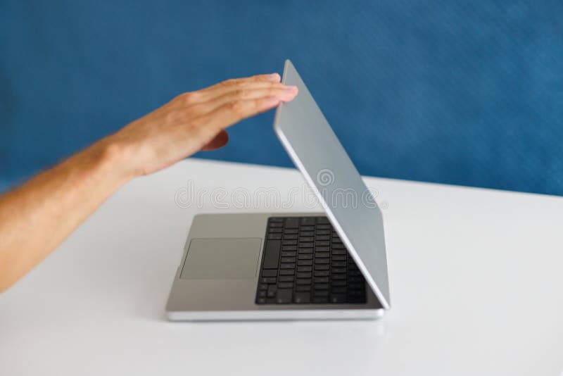 Close Up of Hands Closing Laptop on Table. Person Shutting Down ...