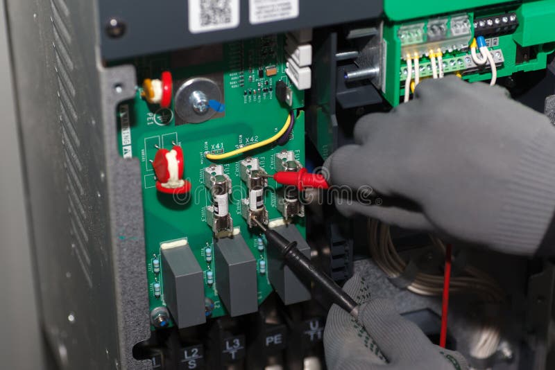 Close-up of Hands Electric Fuse Testing Stock Photo - Image of cable ...