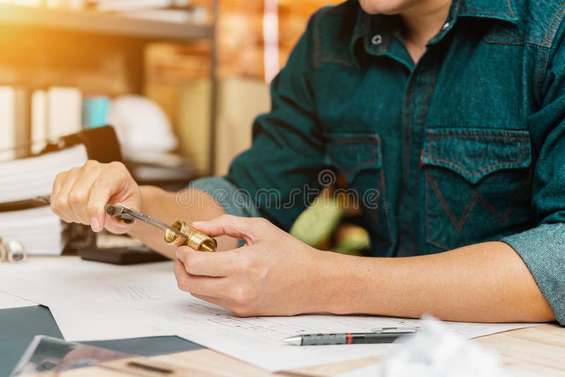 Close Up Hands of an Engineer Measures a Metal Part with Vernier ...