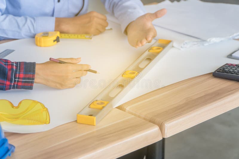 Hands Engineers Working of the Plan on the Table Stock Photo - Image of ...