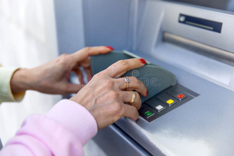 Close-up of Hands Entering Pin at Atm: Secure Personal Banking Concept ...