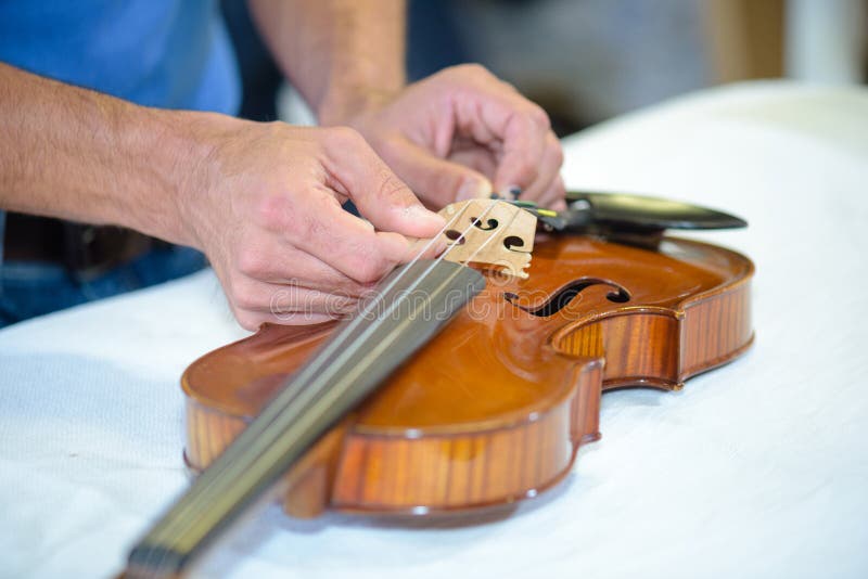 Close Up Hands Fixing String Stock Photo - Image of wooden, construct ...