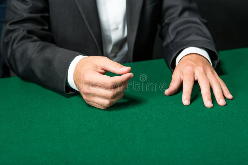 Close Up of Hands of Gambler Sitting at the Poker Table Stock Image ...