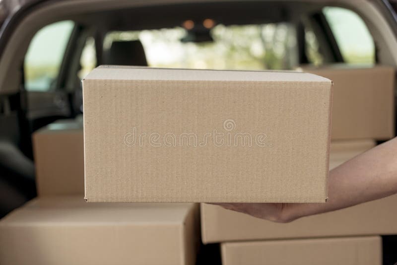 Close Up Hands Holding Package. High Quality Photo Stock Photo - Image ...
