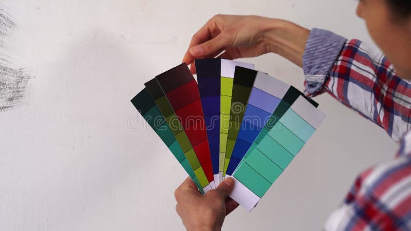 Close Up of Hands House Painter Man Decorator Choose the Color Using ...