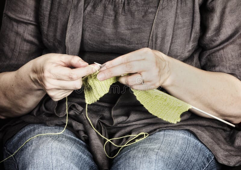 Close up of hands knitting stock photo. Image of creating - 26386594