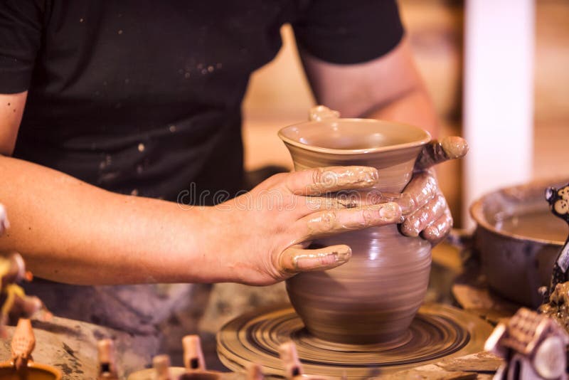 Close-up of Hands Making Pottery on a Wheel Stock Photo - Image of ...