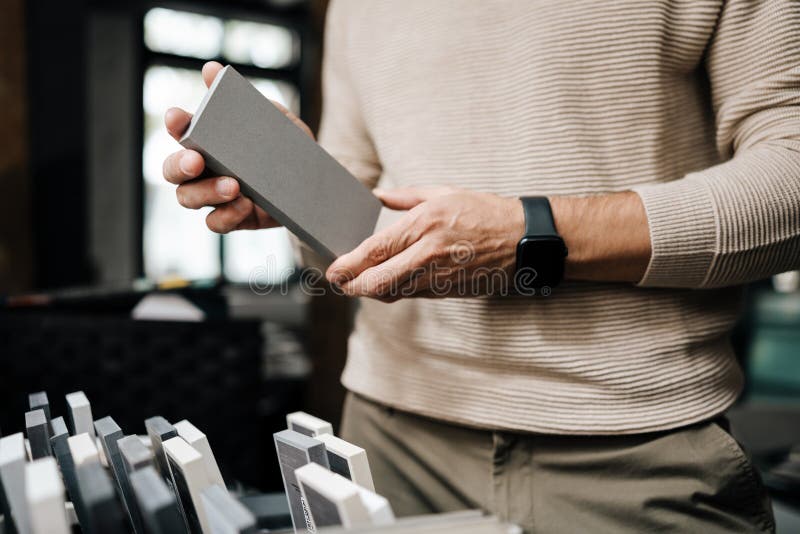 Close Up Hands of Male Designer Working with Samples in Workshop Stock ...