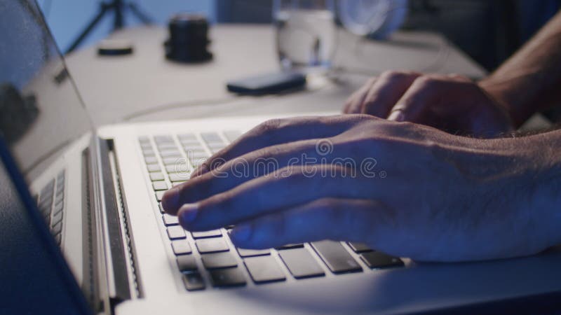 Close-up, the Hands of a Male Video Editor are Processing on a Laptop ...