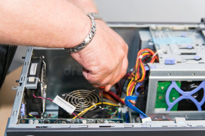 Close-up of Hands of a Man Fixing an Open PC with a Screwdriver Stock ...