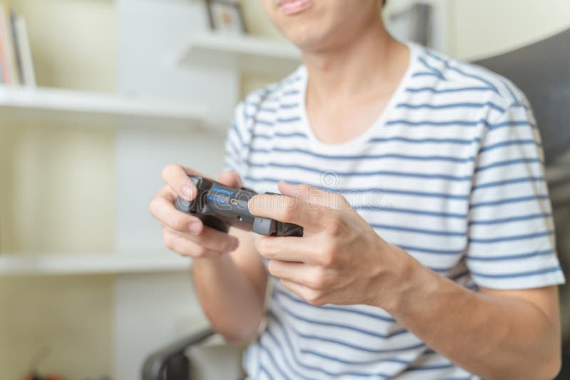 Close Up Hands of Man, Gamer Using Gaming Controller or Game Pad when ...