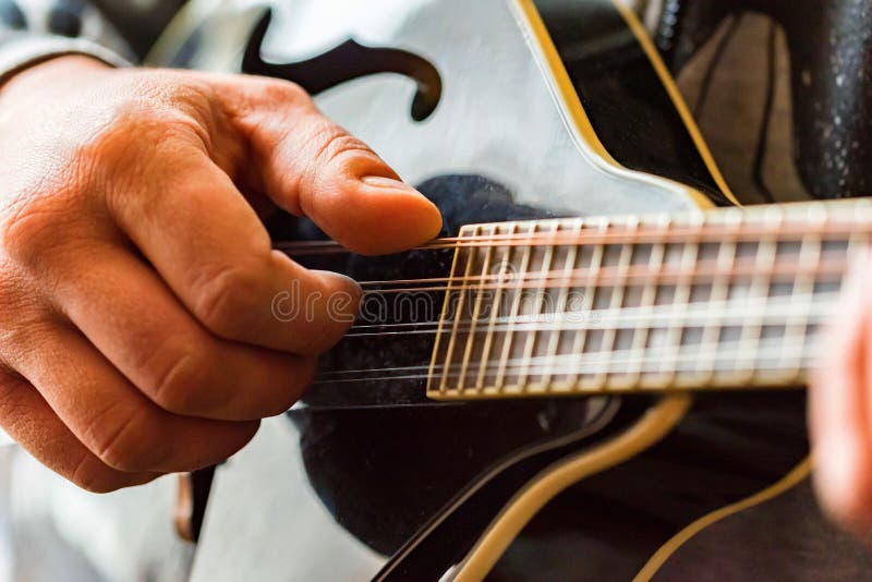 Close Up Hands of Man Playing 8-string Mandolin Stock Image - Image of ...