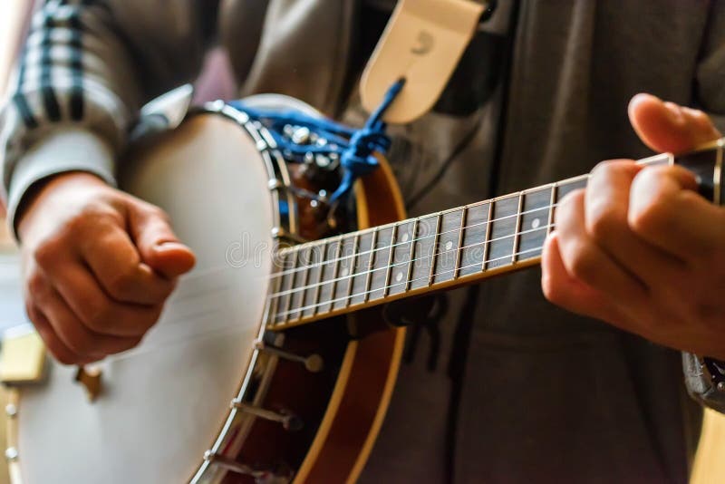 Close Up Hands of Man Playing 8-string Mandolin Stock Photo - Image of ...