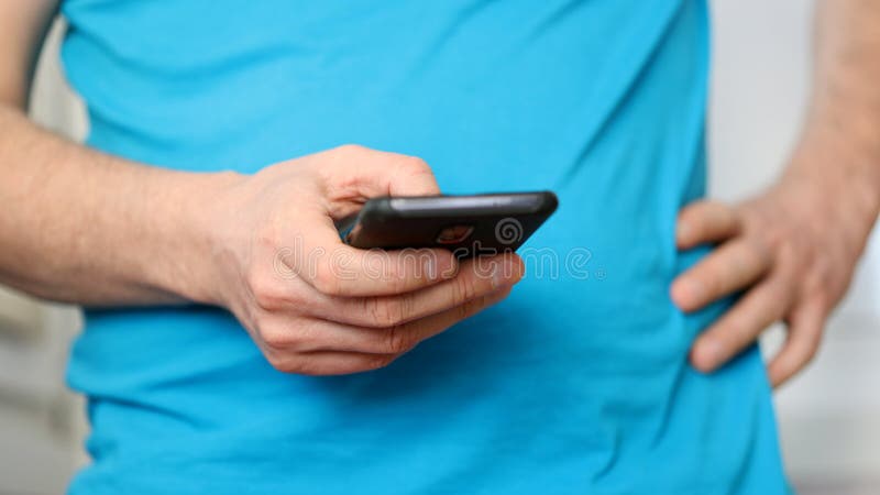 Close-up Hands of Man Texting Message on Mobile Phone. Stock Image ...