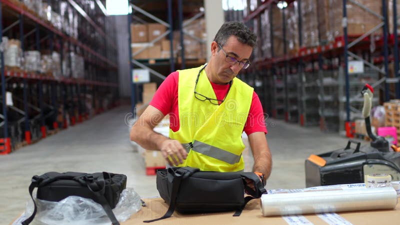 Man Using Scanner To Read a Barcode in the Warehouse Stock Video ...
