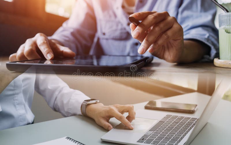 Close Up Hands Multitasking Man Using Tablet, Laptop and Cellphone ...