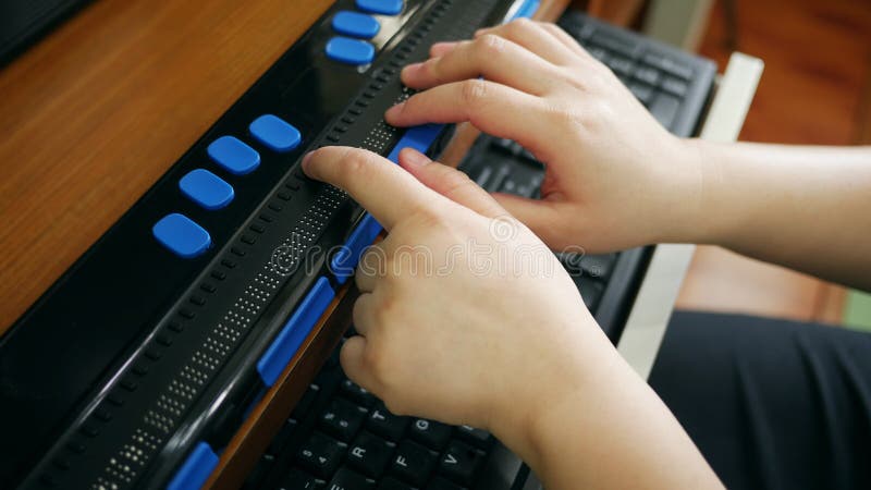 Close-up Hands of Person with Blindness Disability Using Computer with ...