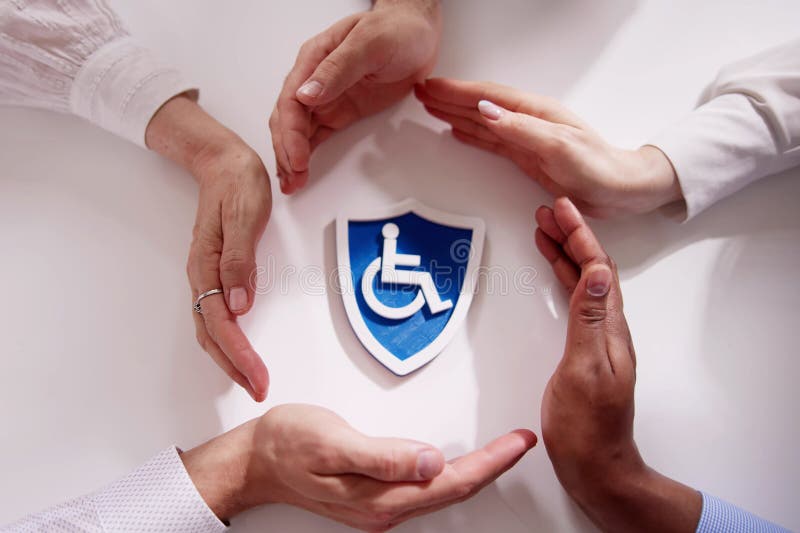 Close-up of a Hands Protecting Disabled Sign Stock Image - Image of ...