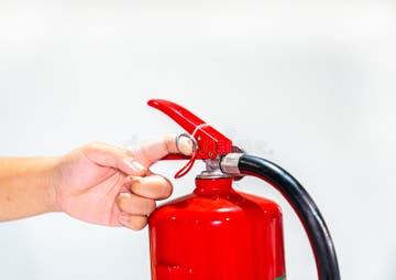 Close Up Hands Pulling Safety Pin of Fire Extinguisher Stock Image ...
