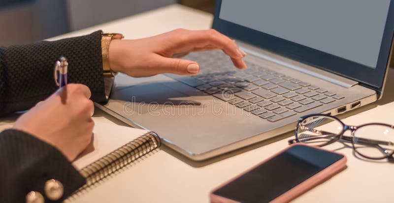 Close Up of a Hands Scrolling on a Laptop and Something Written on ...