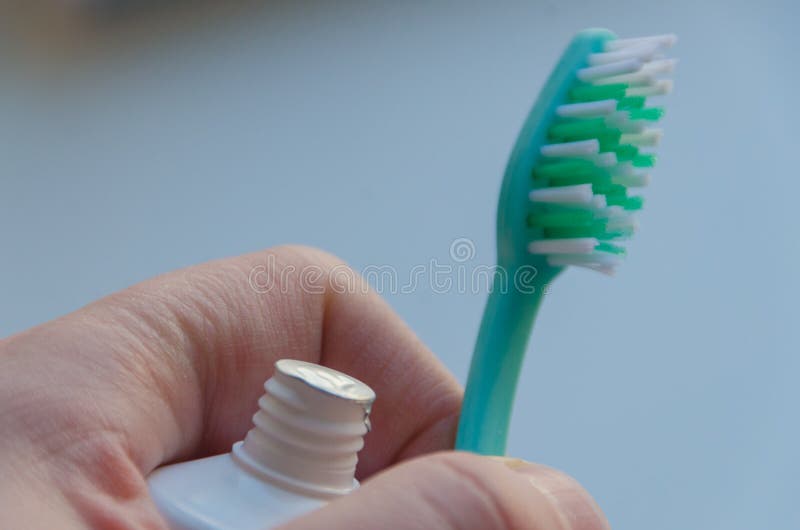 Hands Sealed Toothpaste and Brush Stock Photo - Image of hygiene ...