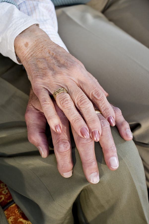 Close-up Hands of Senior Couple Resting on Knee Stock Photo - Image of ...