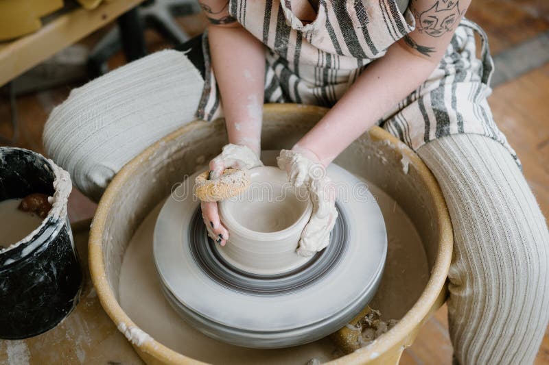 Close-up of Hands Shaping Clay on a Pottery Wheel Stock Photo - Image ...