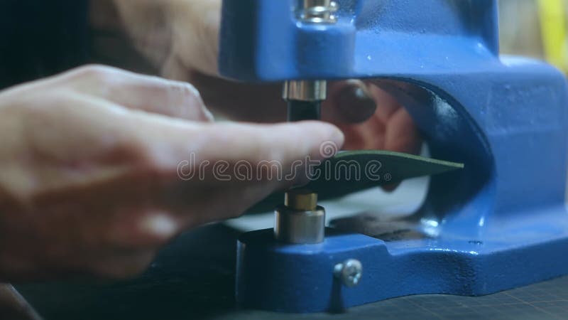 Shoemaker Making Hole in Leather Using Heavy Duty Hole Punch Stock ...