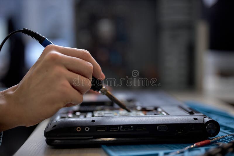Close-up Hands of Technician Repairing Disassembled Laptop Using Tools ...