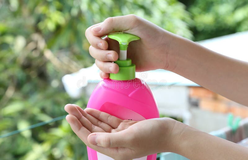Close Up of Hands Trying To Squeeze Out the Soap Stock Image - Image of ...