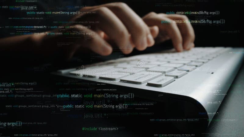 Close-up of Hands Typing on a Computer Keyboard with Programming Code ...