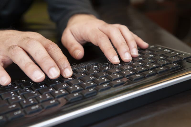Close-up of Hands Typing on a Keyboard in an Office Stock Photo - Image ...
