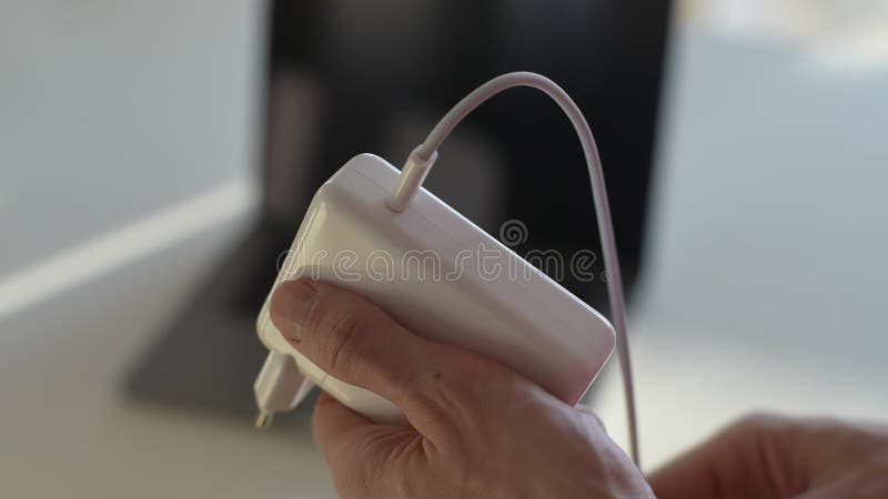 Close-up Hands of Unrecognizable Man Plugging Type-c Cable into Laptop ...
