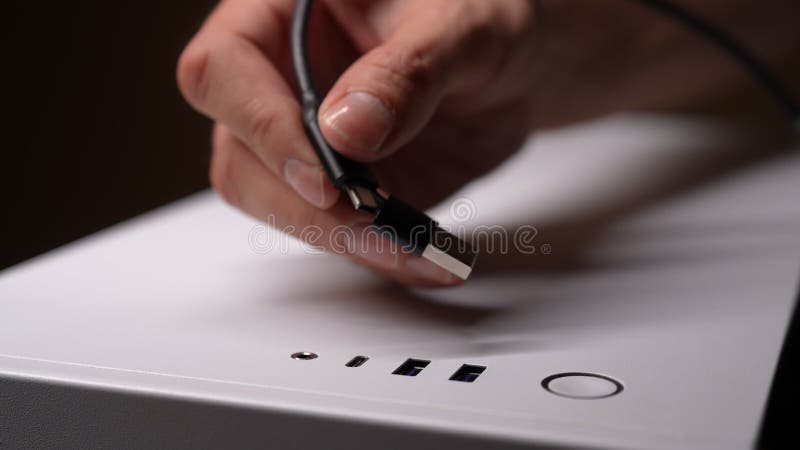 Close-up Hands of Unrecognizable Man Plugging Type-c Cable into White ...