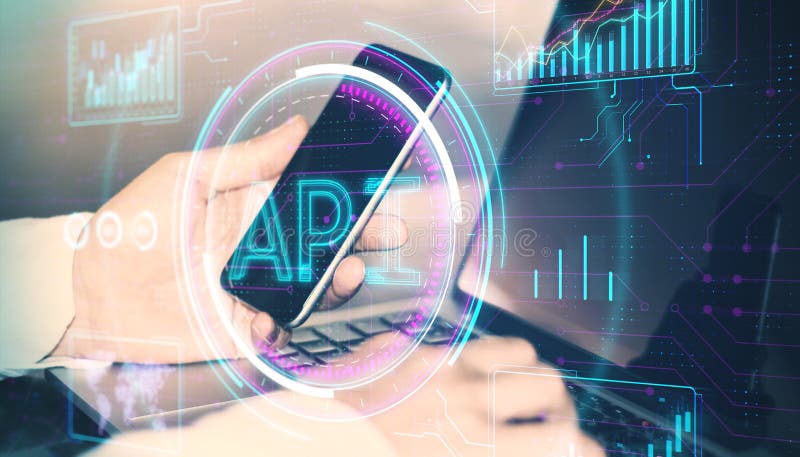 Close Up of Hands Using Laptop and Cellphone with Creative API Hologram ...