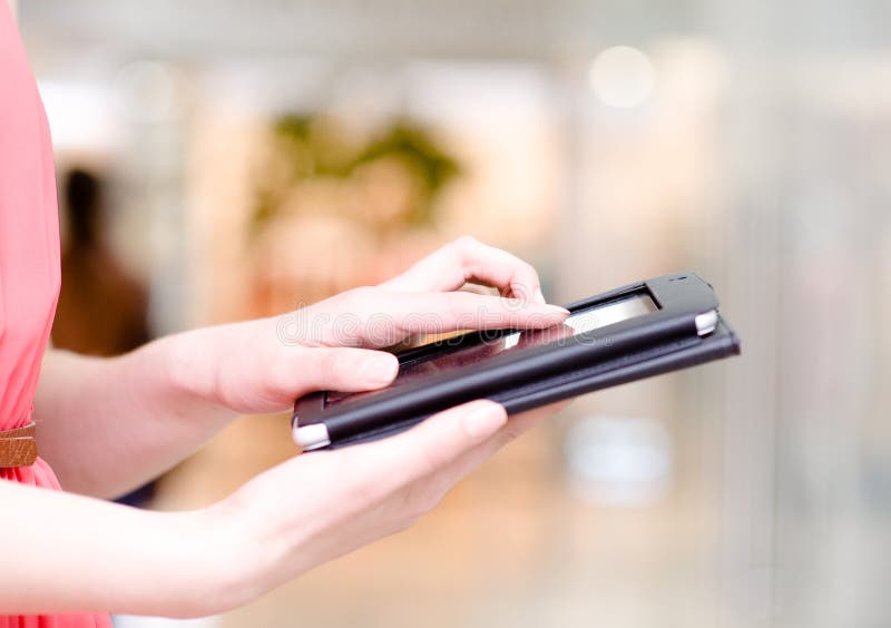 Close Up Hands Using Tablet Computer in Shopping Mall Stock Photo ...