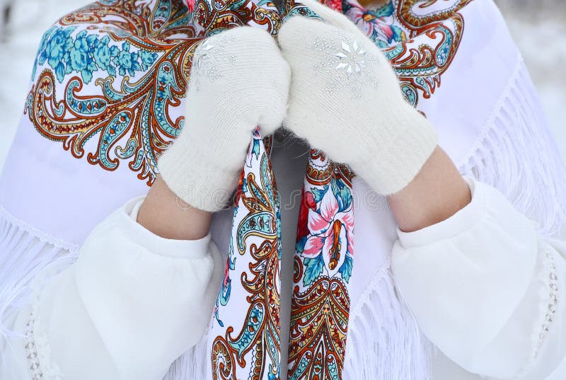 Close-up Hands in White Mittens are Holding an Elegant Bright Shawl ...