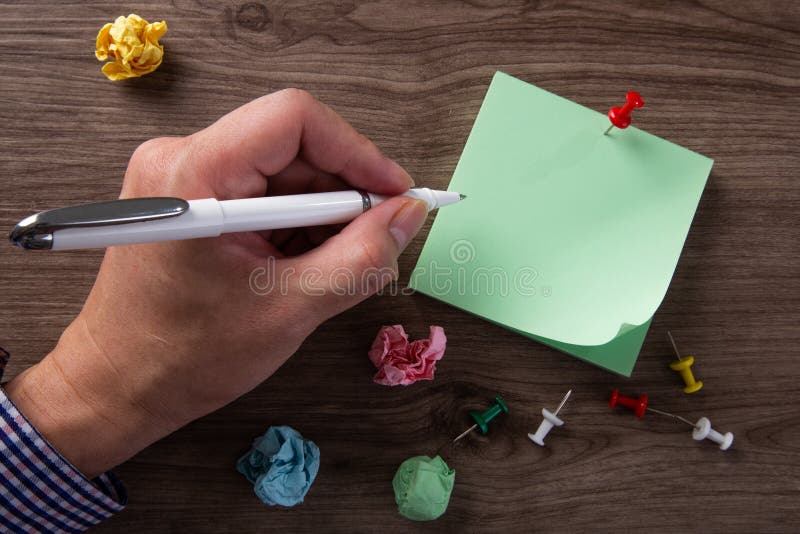 Close Up of a Hands Writes on Sticky Note Pad Stock Photo - Image of ...