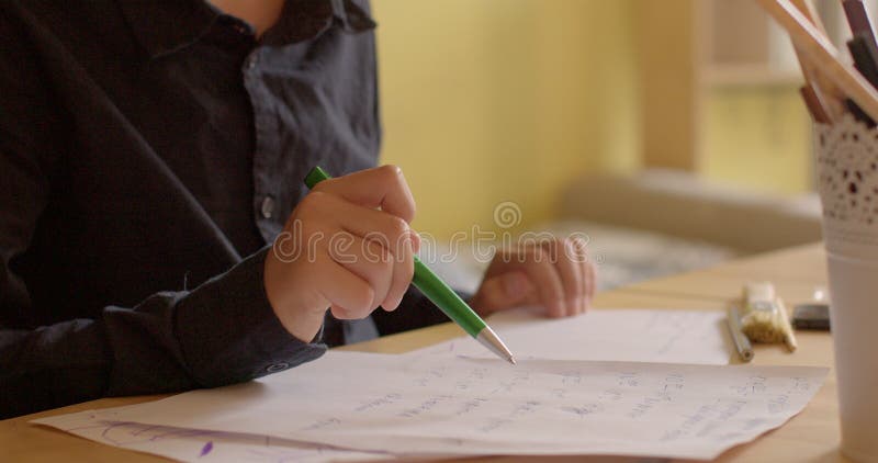 Student Studying Home, Engaged in Academic Activities while Using Green ...