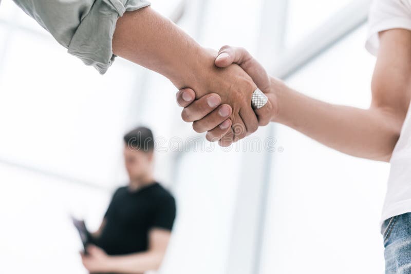 Close Up. Handshake Business Partners on Blurred Office Background ... Close Up. Handshake Business Partners on Blurred Office Background ...