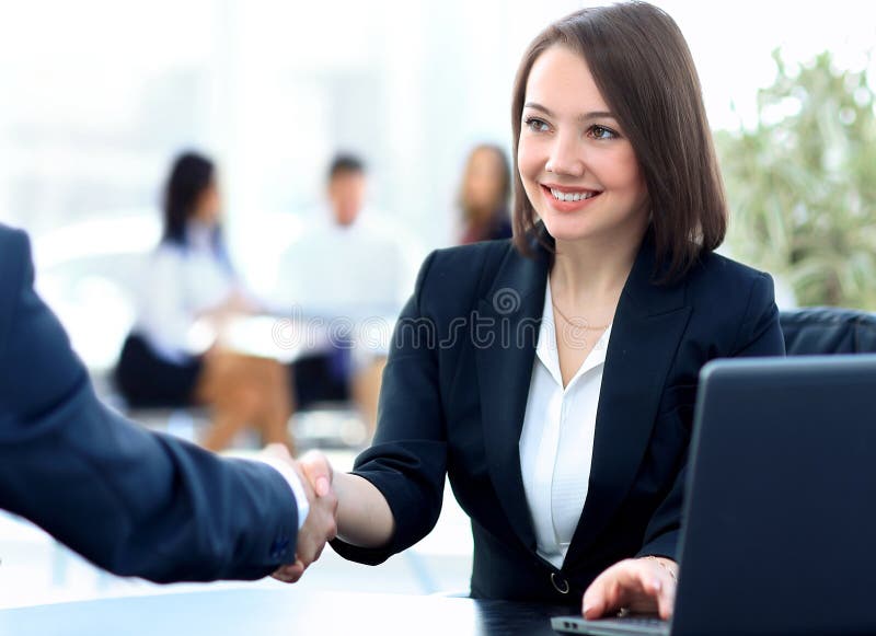 Close-up of a Handshake of a Manager and Customer in the Workplace ...