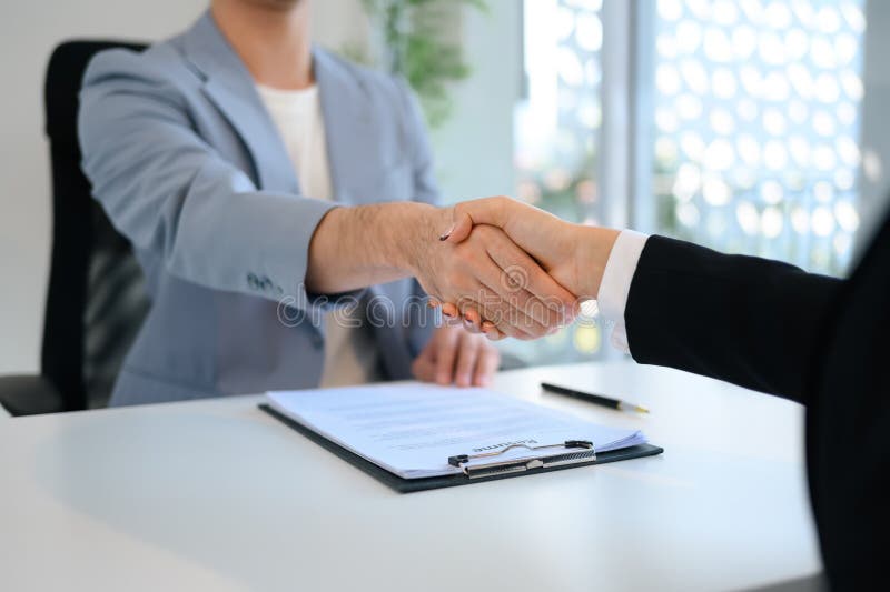 Successful Job Interview with Handshake in Office. Enthusiastic Stock ...