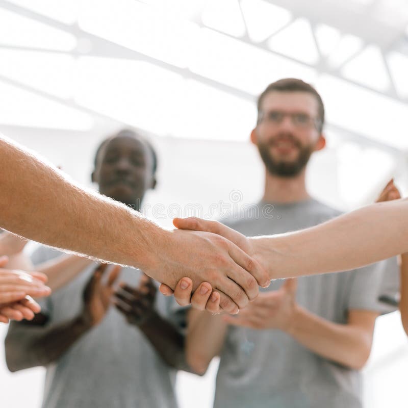 Close Up. Handshake of Two Students on the Background of the St Stock ...