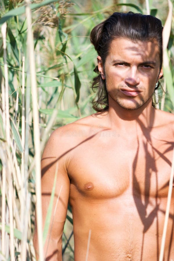 Close-up Handsome Man in Rush Stock Photo - Image of grass, athletic ...