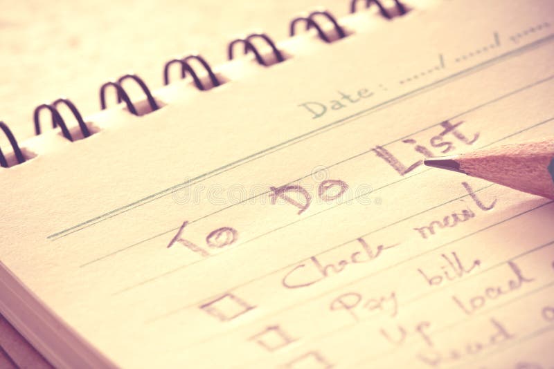 Close Up Handwritten To Do List Plan in Small Note Book Stock Photo ...