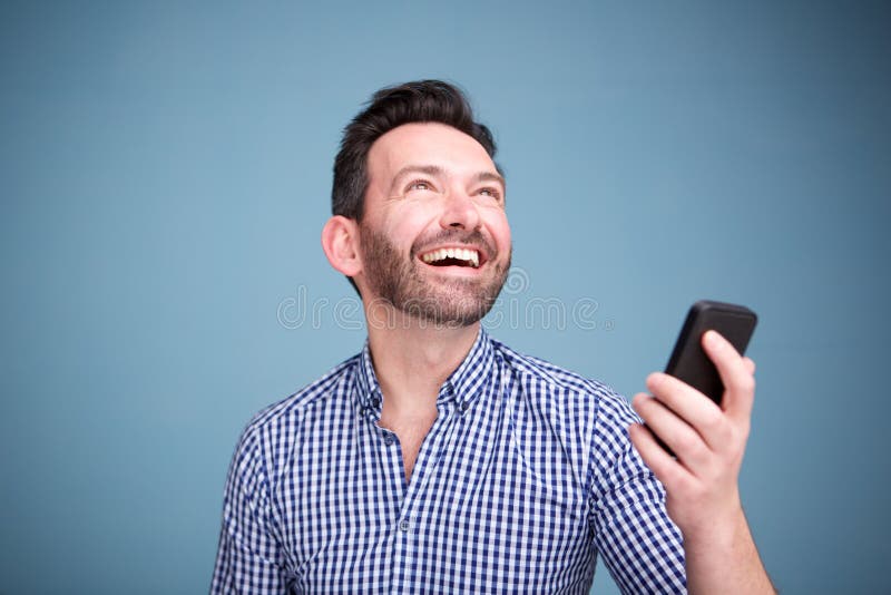 Close Up Happy Man Holding Cellphone and Looking Up Stock Photo - Image ...