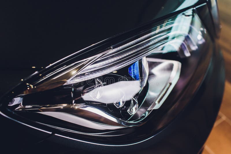 Close Up Headlights Front Side View , Black Color Car in Room. Stock ...
